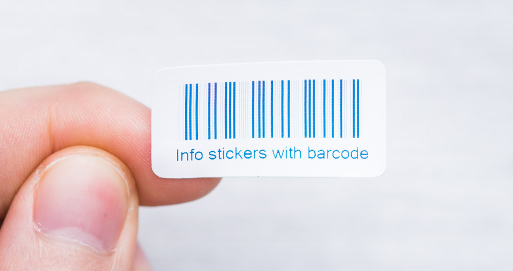 Adhesive labels and stickers made of synthetic fibres